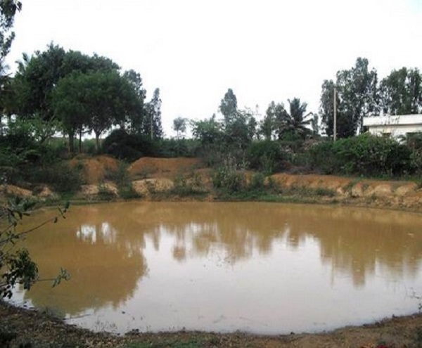 Locals construct recharge pond for protection of water source ...